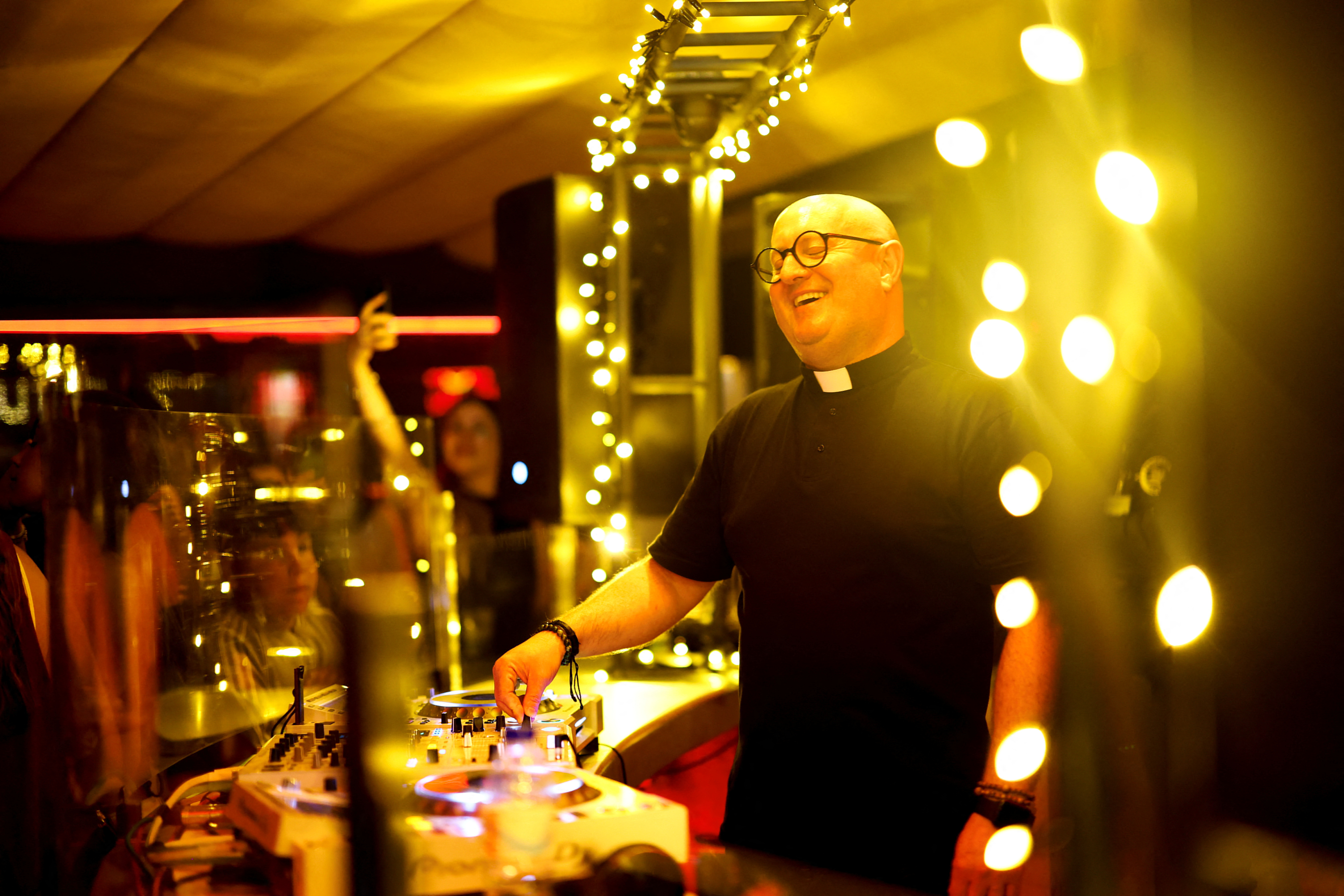 Portuguese 'DJ priest' plays upbeat tunes to spread hope