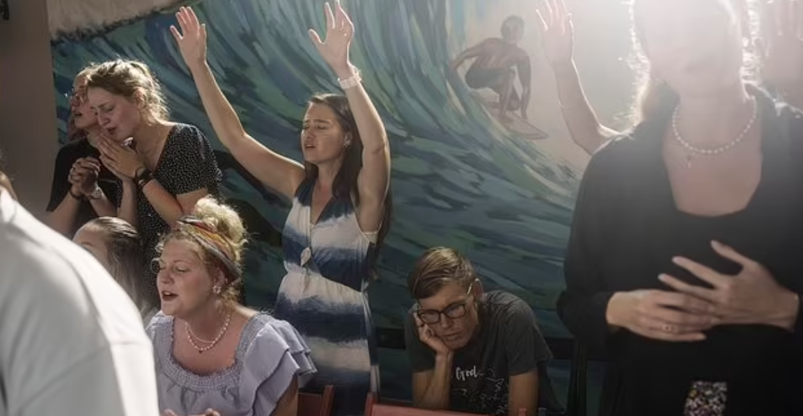 HOLD --- Surfing the Lord: Portugal beach church embraces ocean ministry