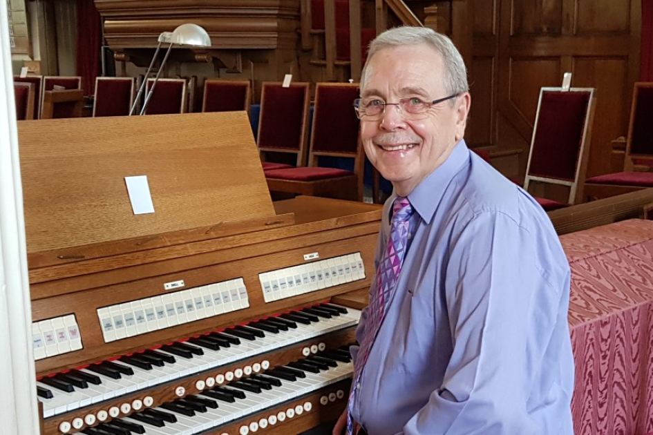Organist recognised in Scottish parliament for 60 years of playing