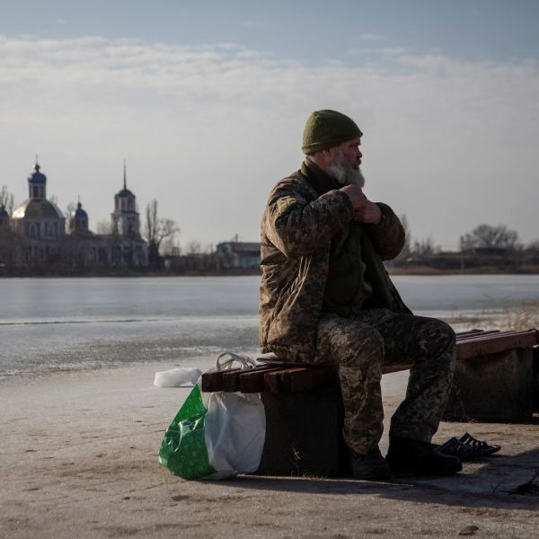 Photos show Ukrainian soldiers marking Epiphany with ice cold plunge ...