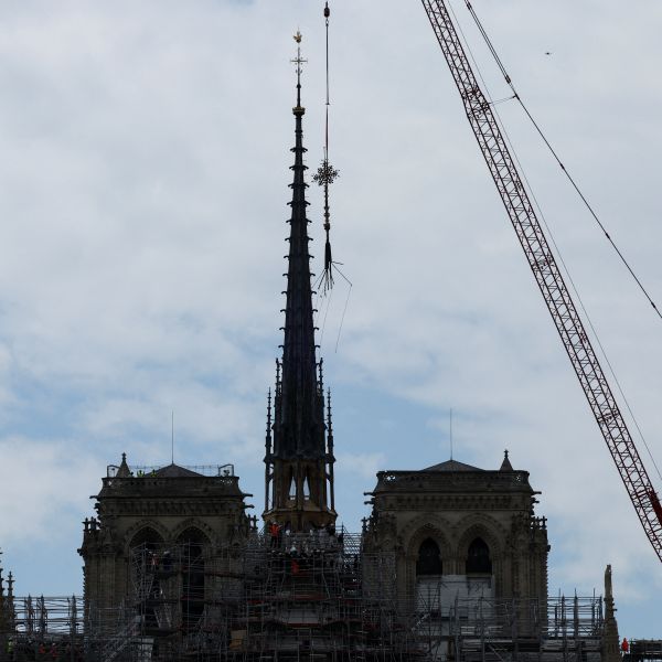 Notre Dame cathedral cross reinstalled