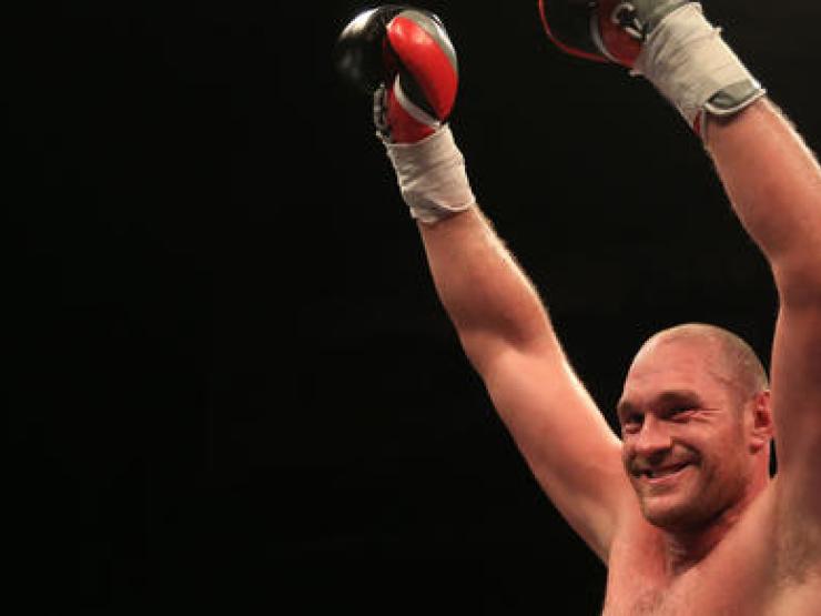 Christian boxer Tyson Fury gives up titles