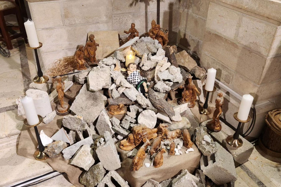 Bethlehem church places baby Jesus among rubble in nativity scene