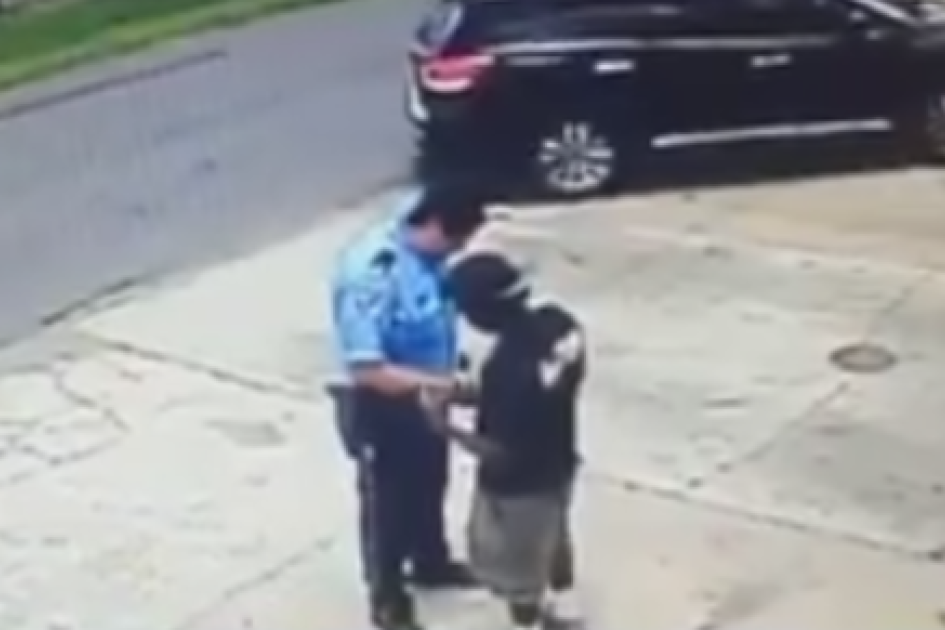 Black Christian rapper prays with white police officer in USA